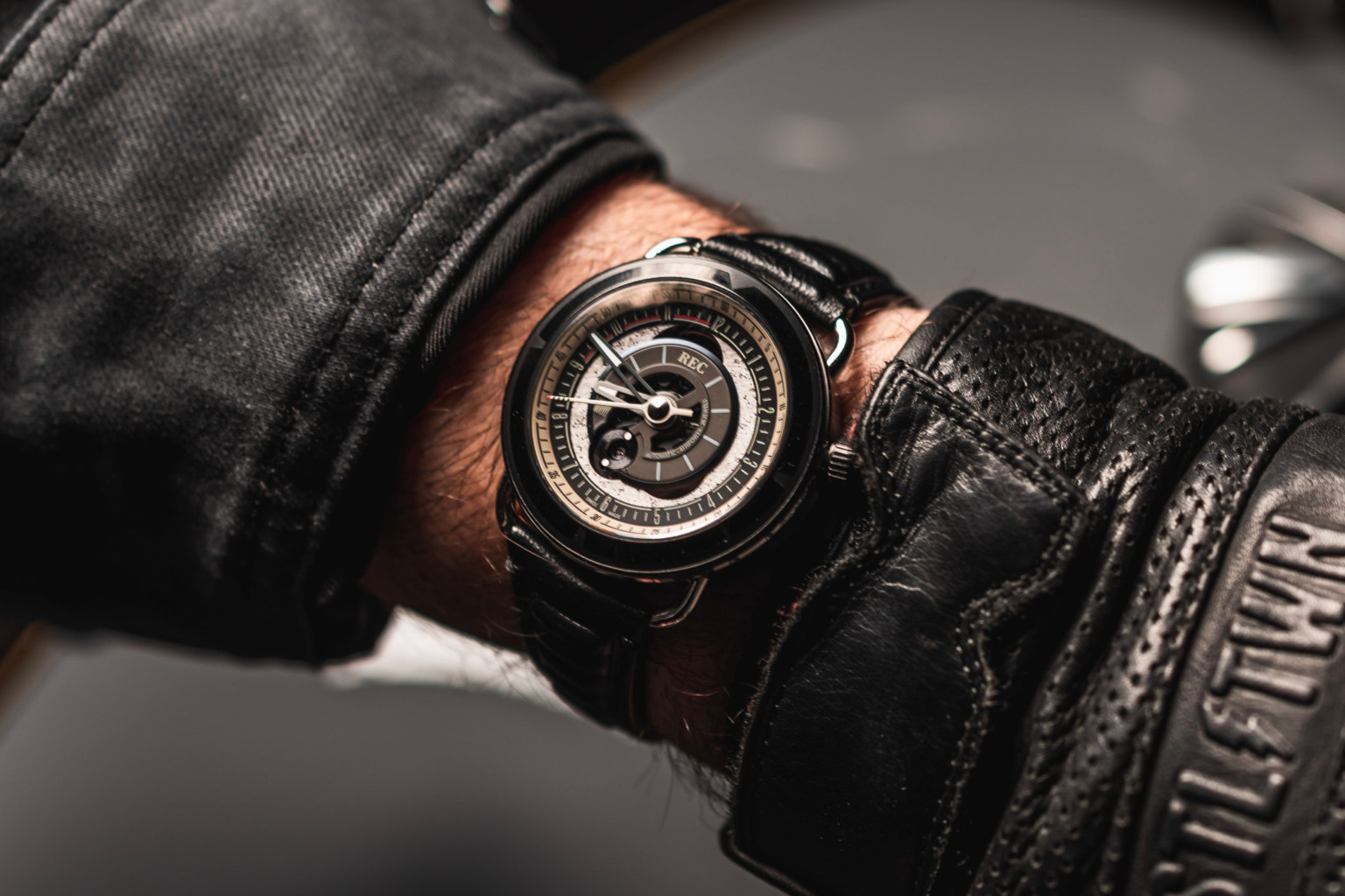 The REC Watches TTT Icon1000 uses actual motorcycle parts for a dial.